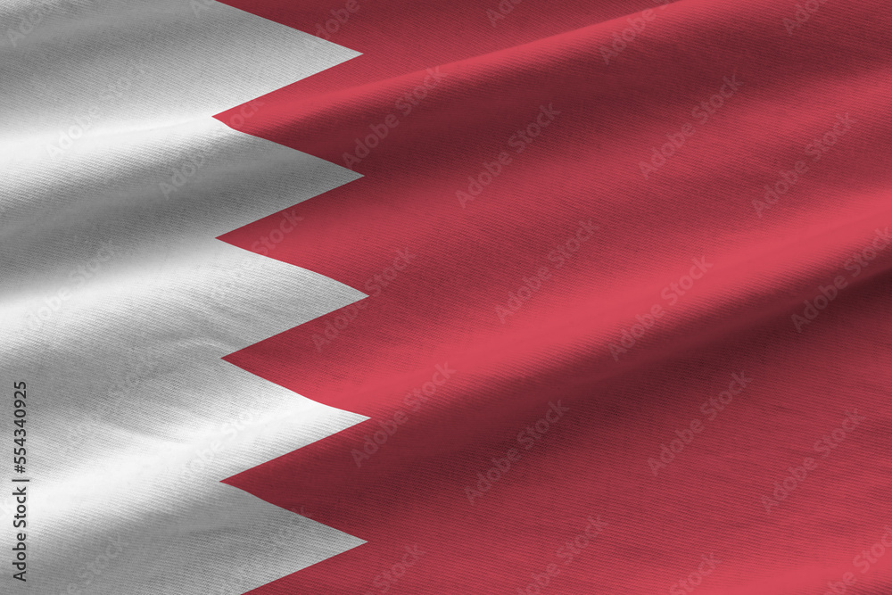 Bahrain flag with big folds waving close up under the studio light ...