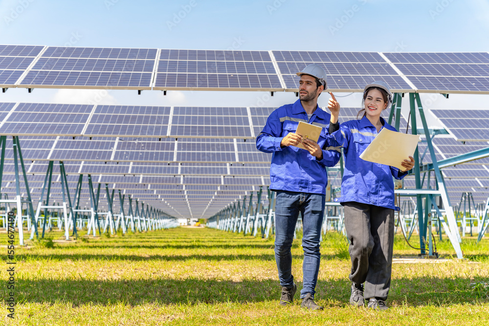 Electrical engineers are examining the working conditions of many solar ...