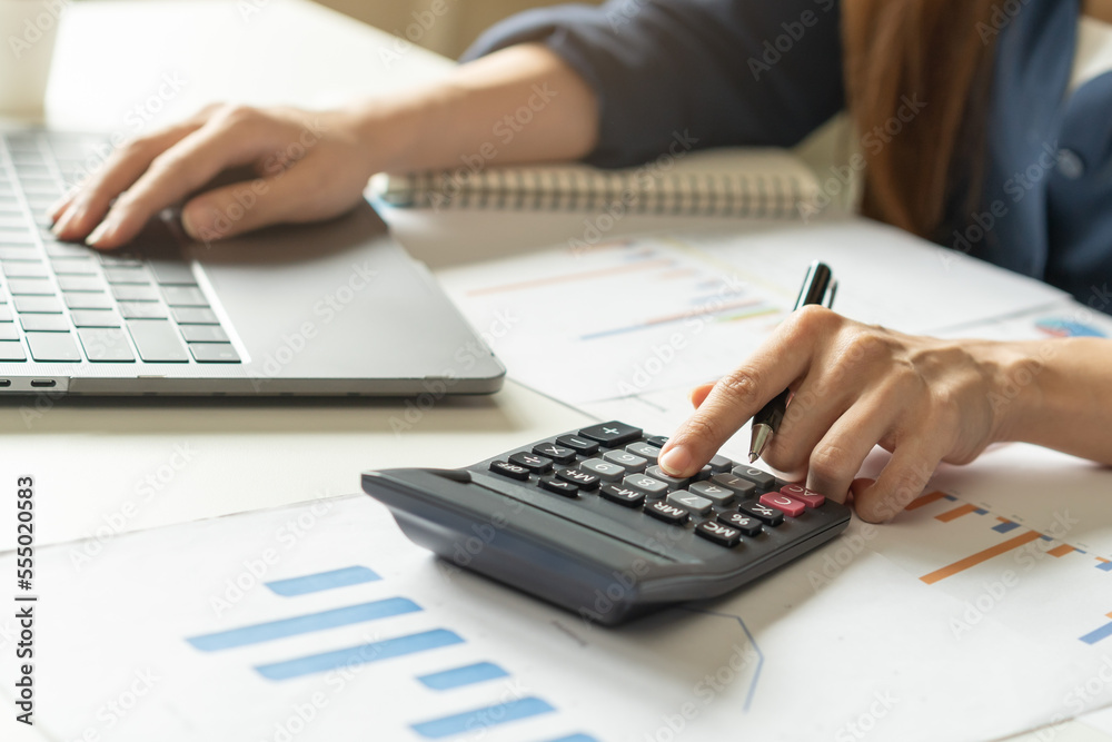 Account finance, asian young business woman hand using calculator ...