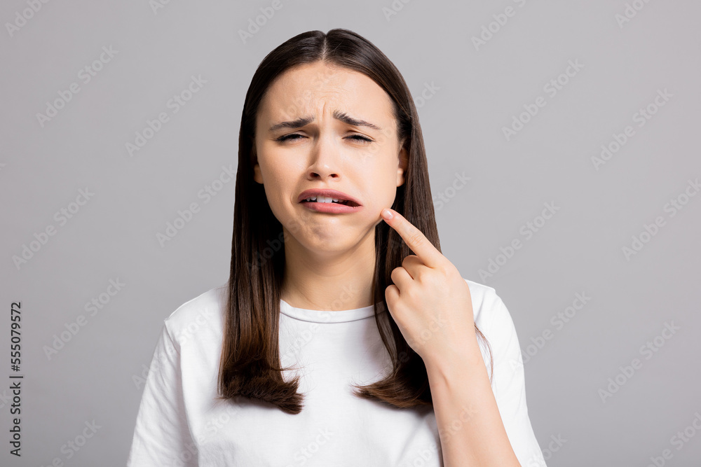 Crying tired sad woman suffers from painful toothache dental illness ...