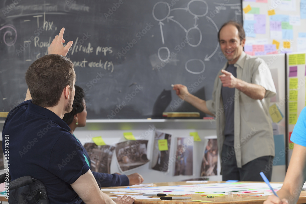 Engineering instructor with Aspergers demonstrating project bubble ...