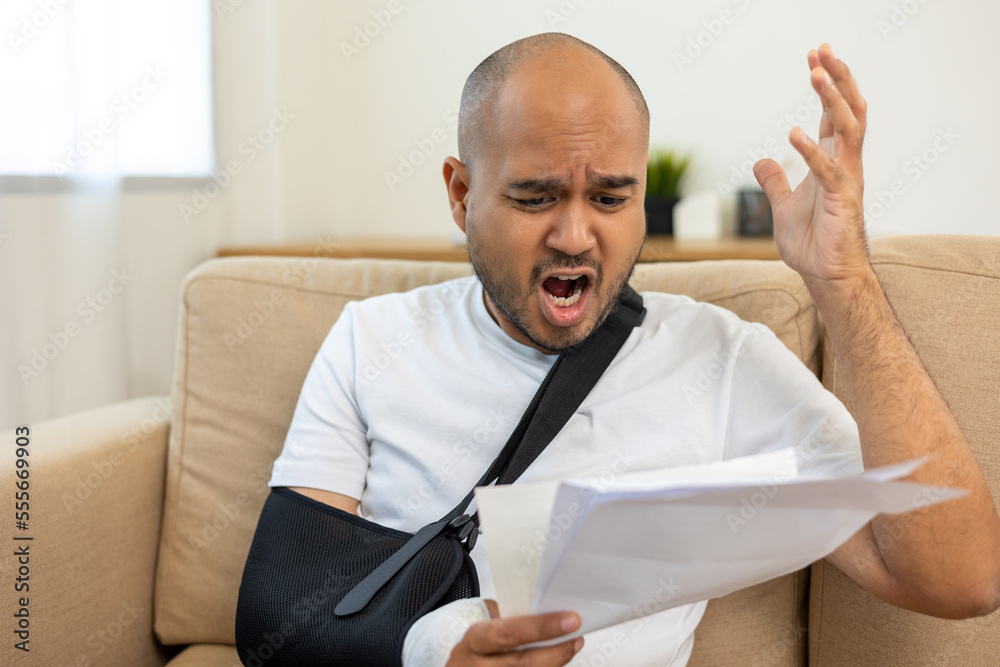 UnHappy man stressed pay invoice medical expenses from accident ...