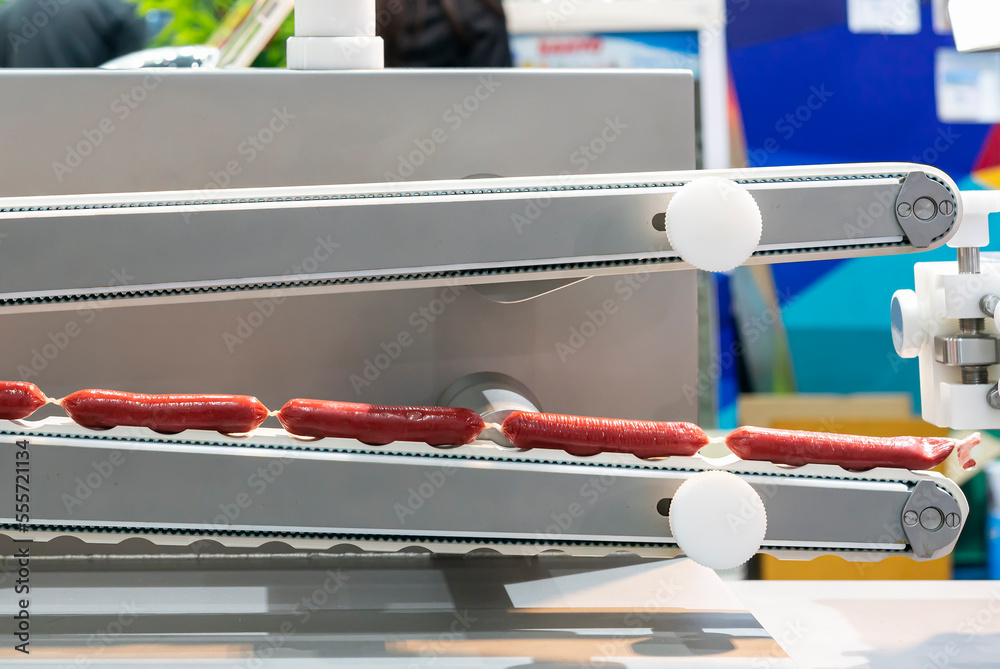 sausage chain during produced by past on conveyor system of automatic ...