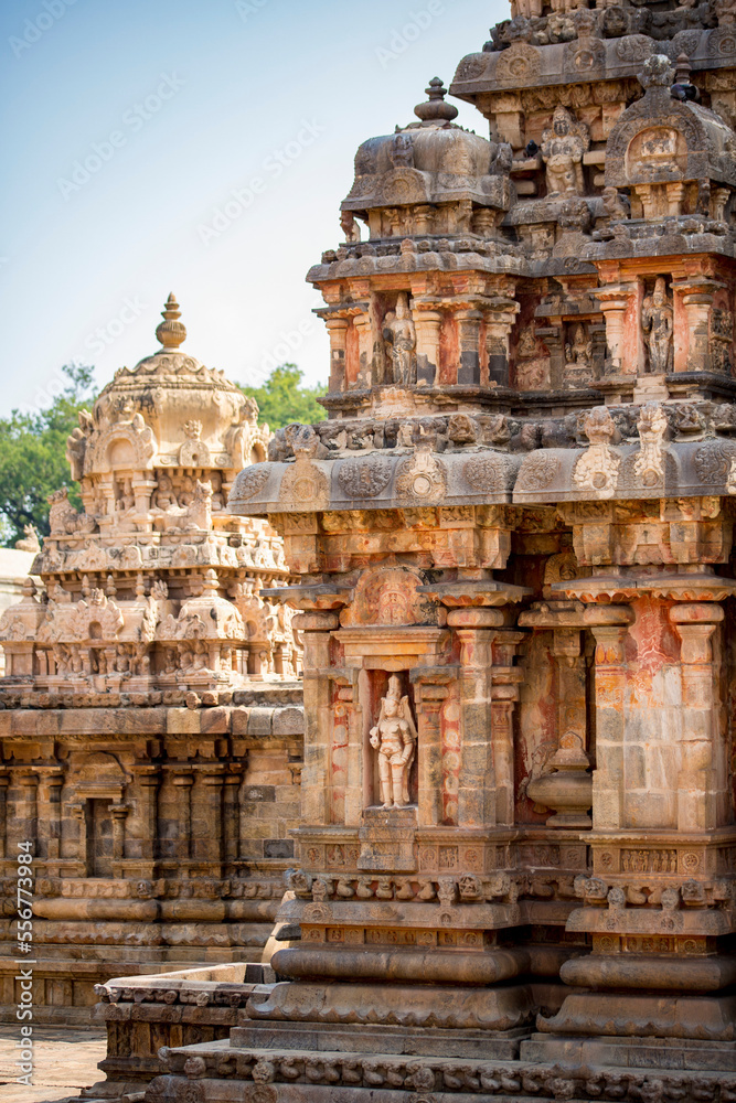 Temple structures, alcove with Hindu deity carving in stone wall of ...