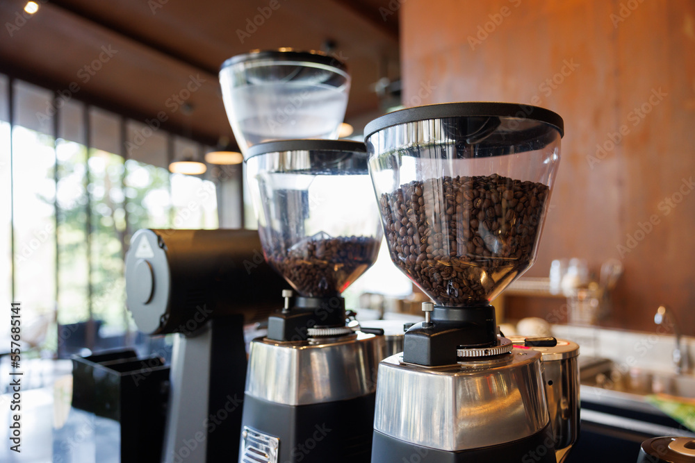 grinder coffee machine. Coffee beans inside the machine hopper of ...