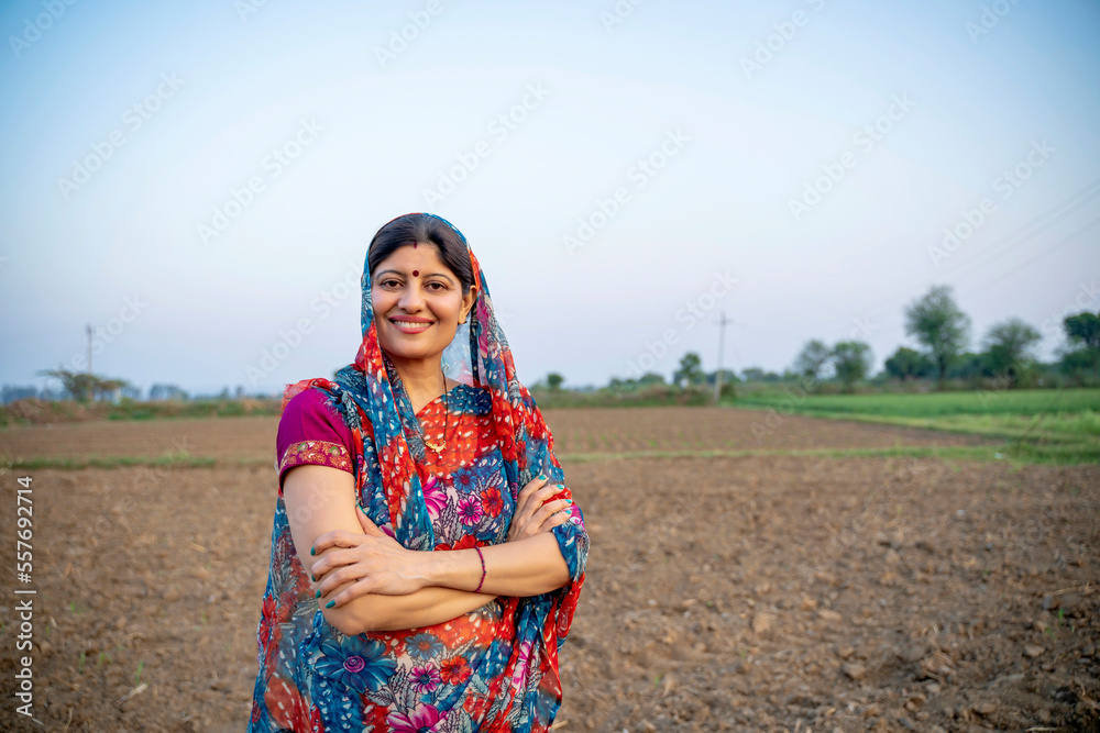 Indian rural woman in traditional saree at agriculture field. Stock ...
