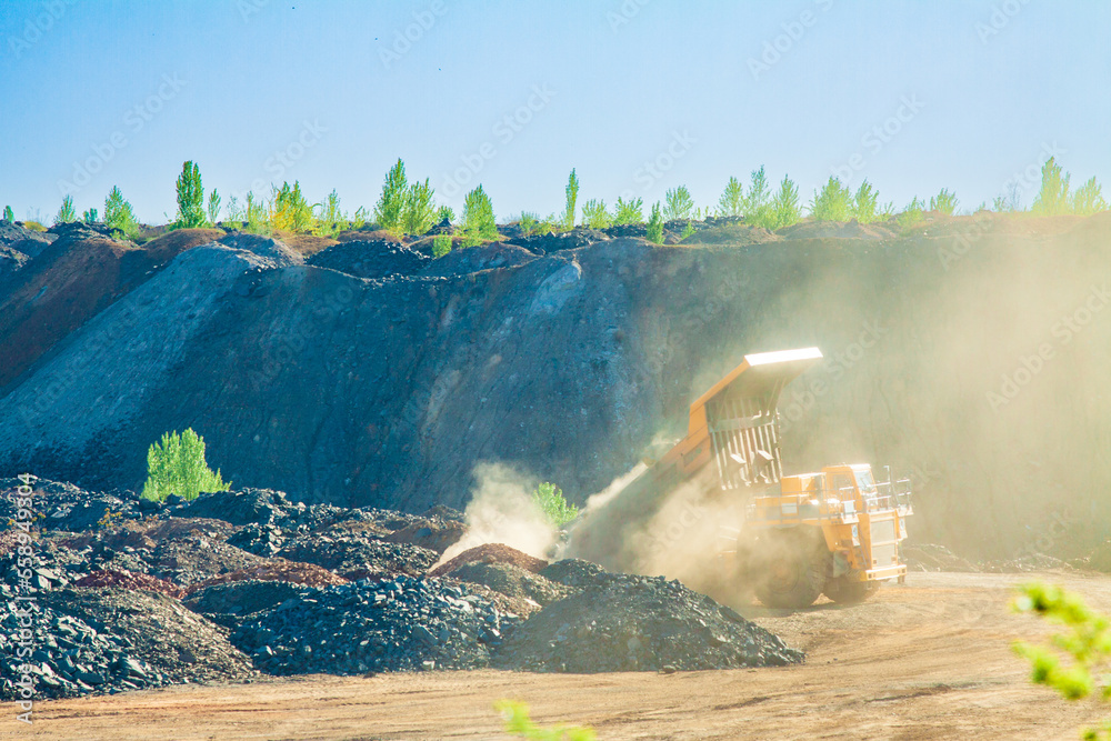 Large quarry dump truck to remove the rock mass from the quarry for the ...