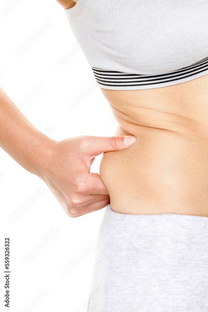 Weight gain - woman gaining weight touching fat pinching waist. Female ...