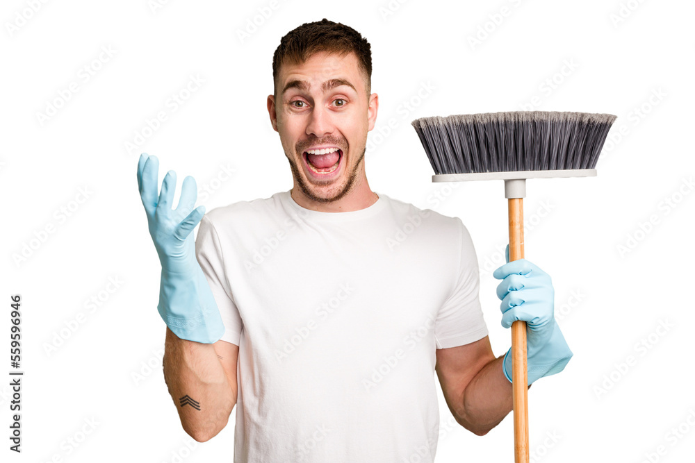 Young man holding a broom to clean his house cut out isolated receiving ...