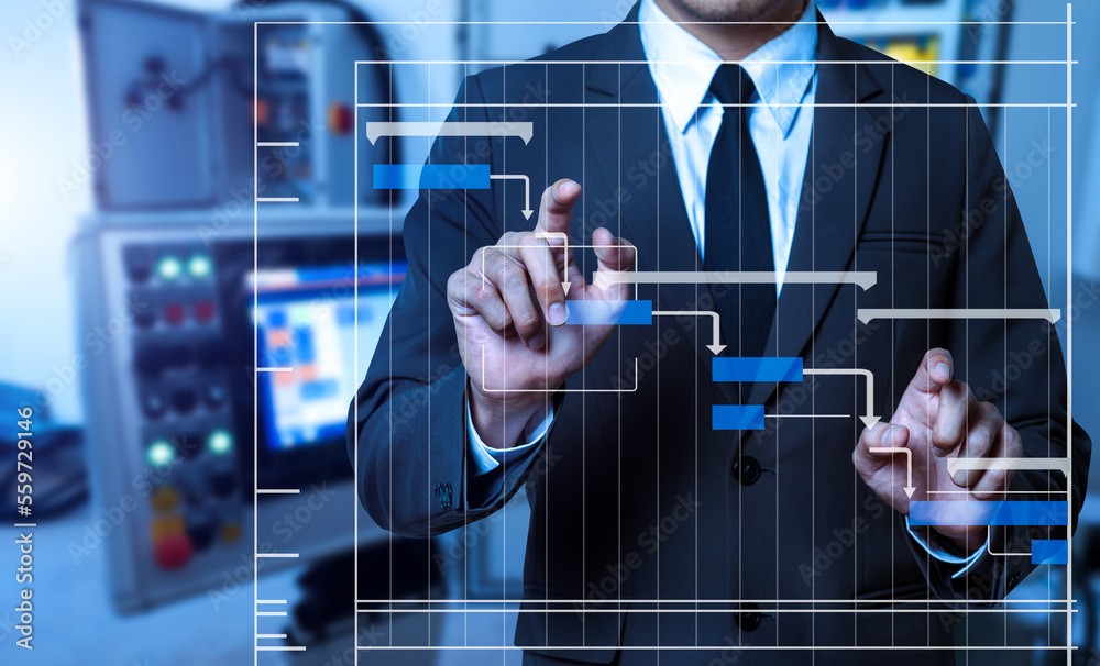 Project manager working and update tasks with milestones progress ...