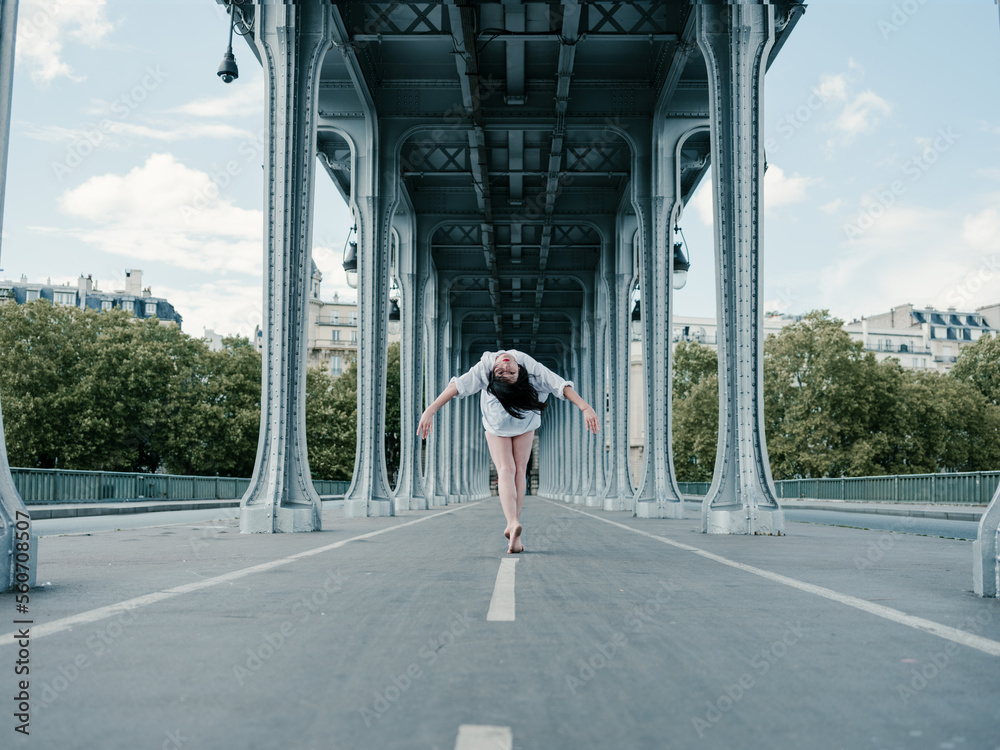 Girl doing gymnastics outside Stock Photo | Adobe Stock