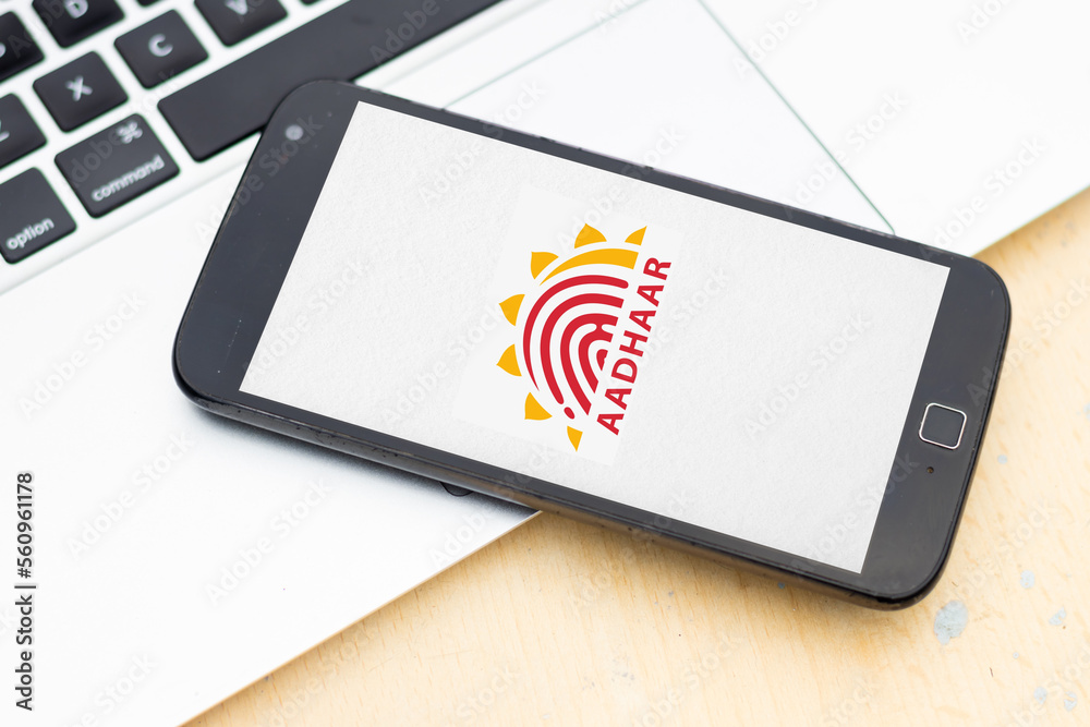 aadhaar logo on smartphone screen for indian digital identity and ...