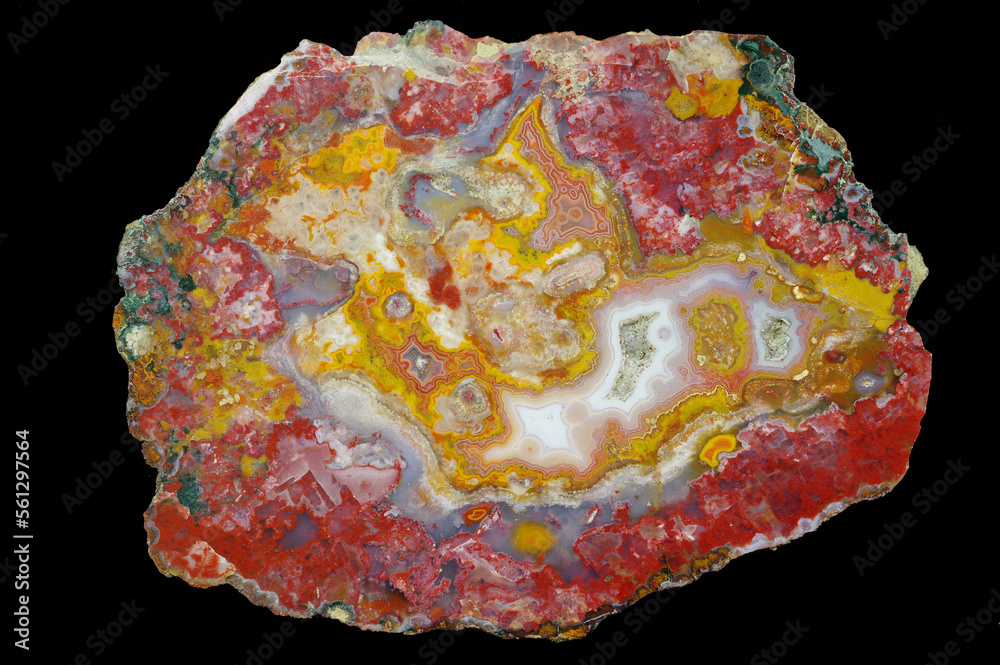 A cross section of the agate stone with quartz geode. Multicolored ...