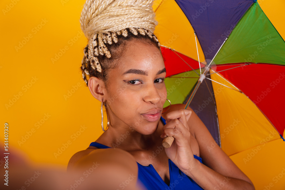 beautiful black Brazilian woman, dressed in carnival clothes, blue, and ...