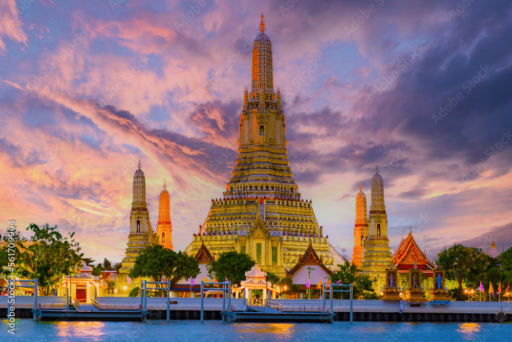 Wat Arun temple Bangkok during sunset in Thailand. Chao praya river ...