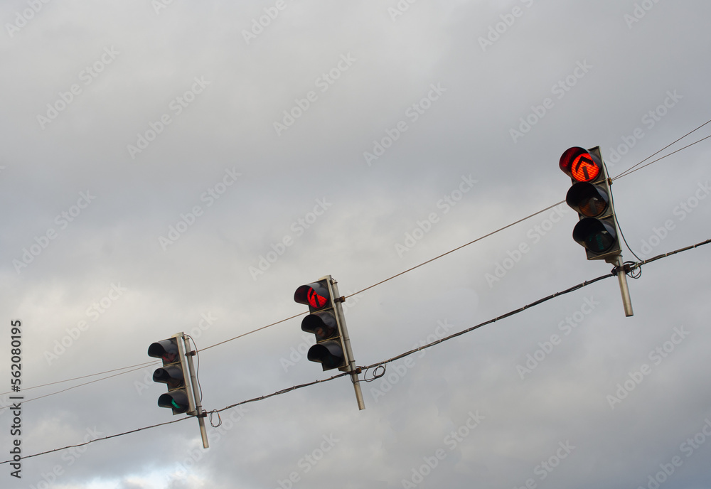 Traffic lights in red light regulating the traffic of a city. Driving ...