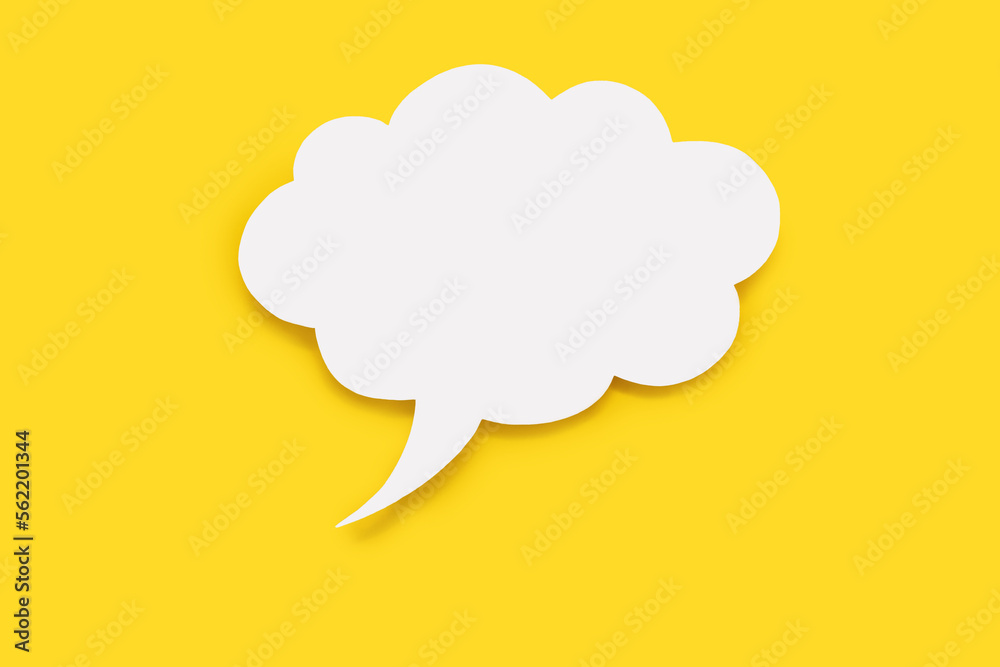 Speech bubble in the form of a cloud on a yellow background. Free space ...