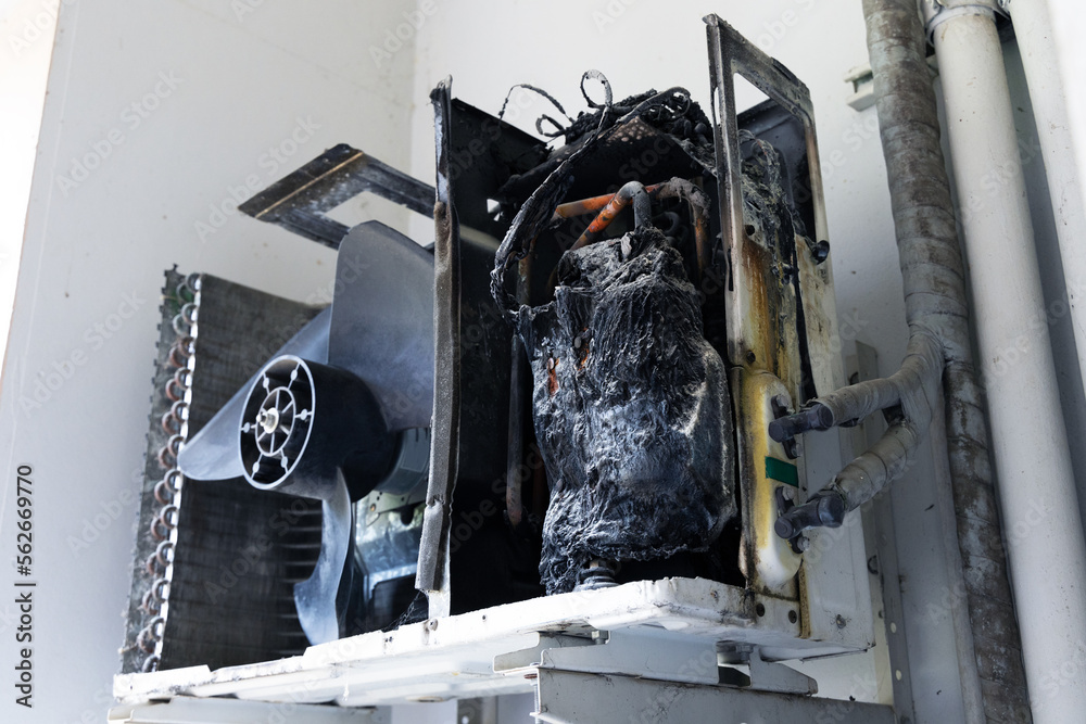 Fire burned damage on compressor air conditioner in office building ...