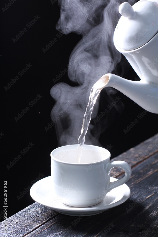 Tea is an aromatic beverage prepared by pouring hot or boiling water ...