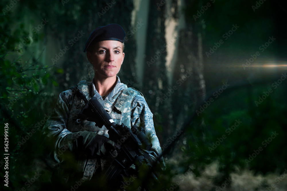 An Air Force Security Forces member patrols the area around a ...