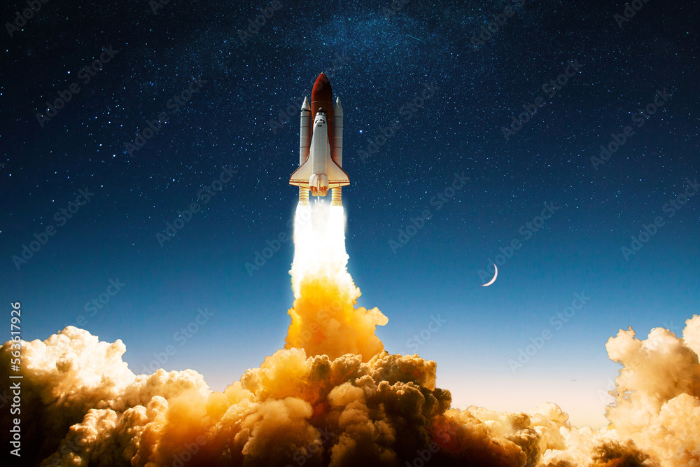 New space shuttle rocket with smoke and blast successfully launches into the starry blue sky ...
