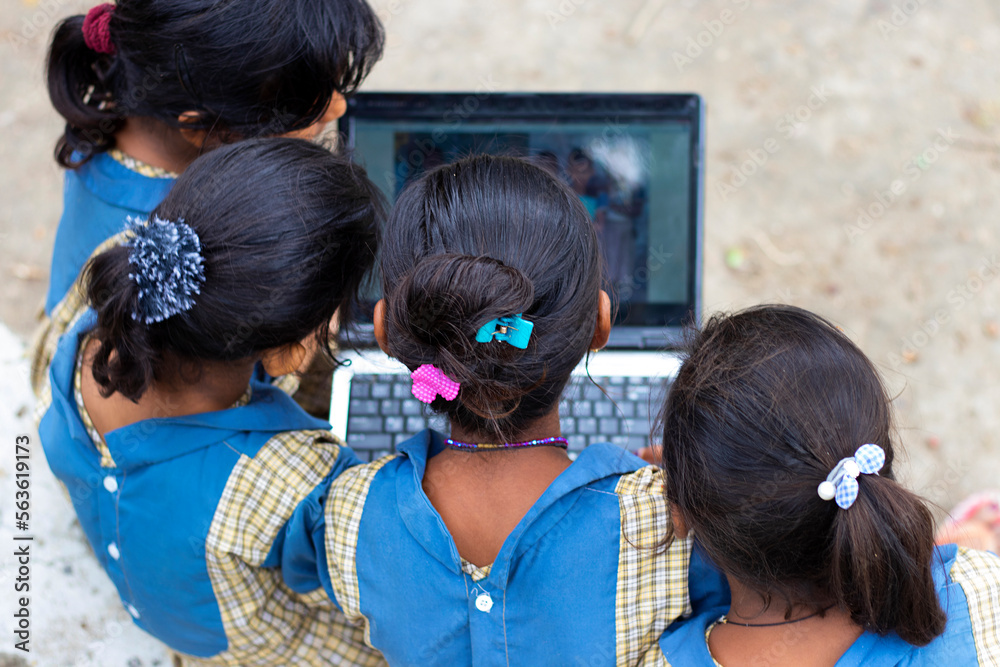 indian village government school girls operating laptop computer system ...