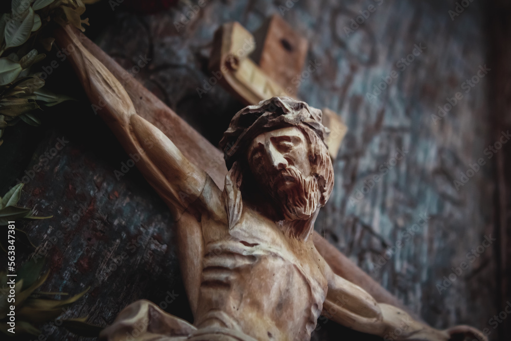 Jesus Christ crucified (an ancient wooden statue) (details) Stock Photo | Adobe Stock