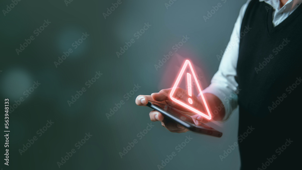 System hacked warning alert, Man using smartphone with cyber attack ...