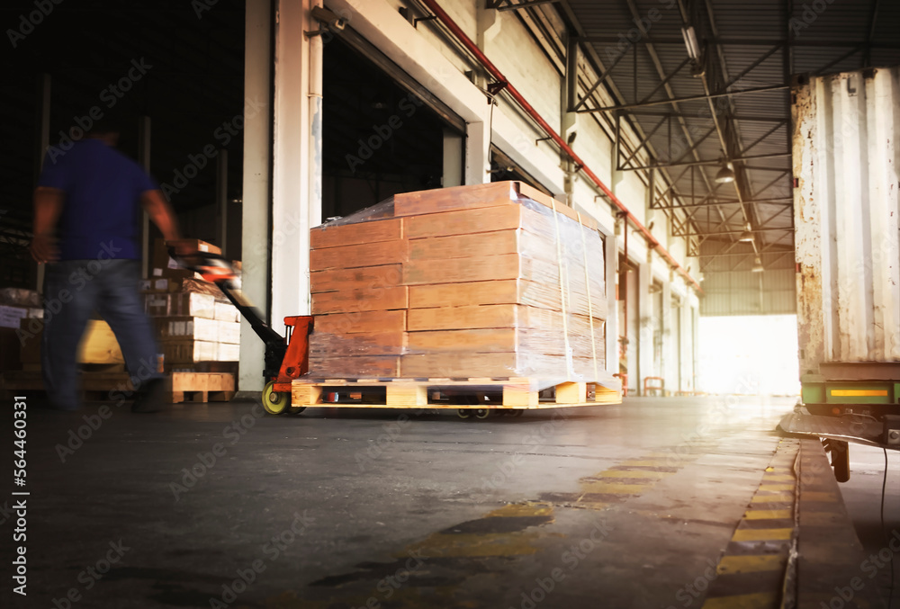 Workers Unloading Package Boxes on Pallets in Warehouse. Cartons ...