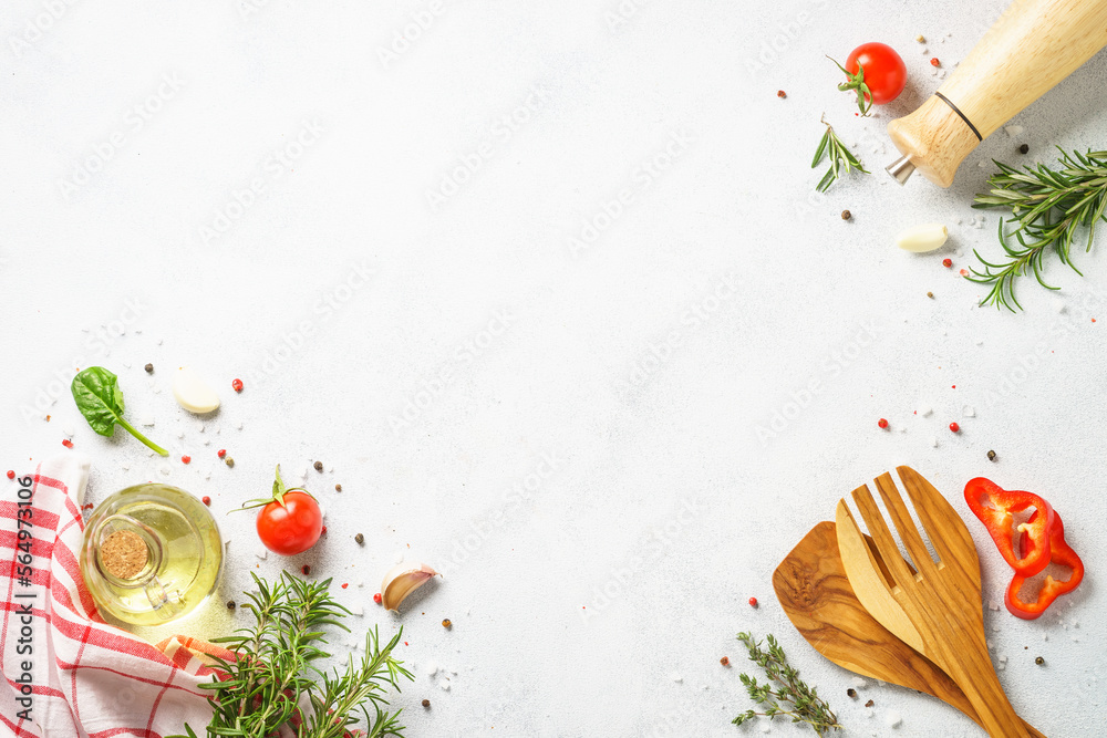 Ingredients for cooking. Food background with herbs and vegetables. Top view on white background ...