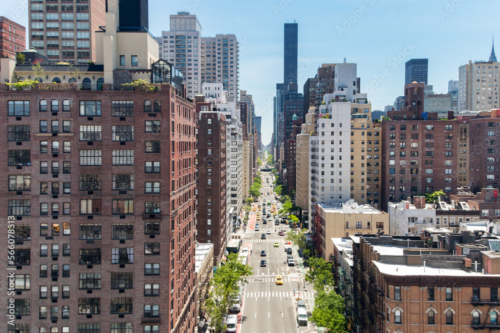 Overhead view First Avenue with traffic drivings through the buildings ...