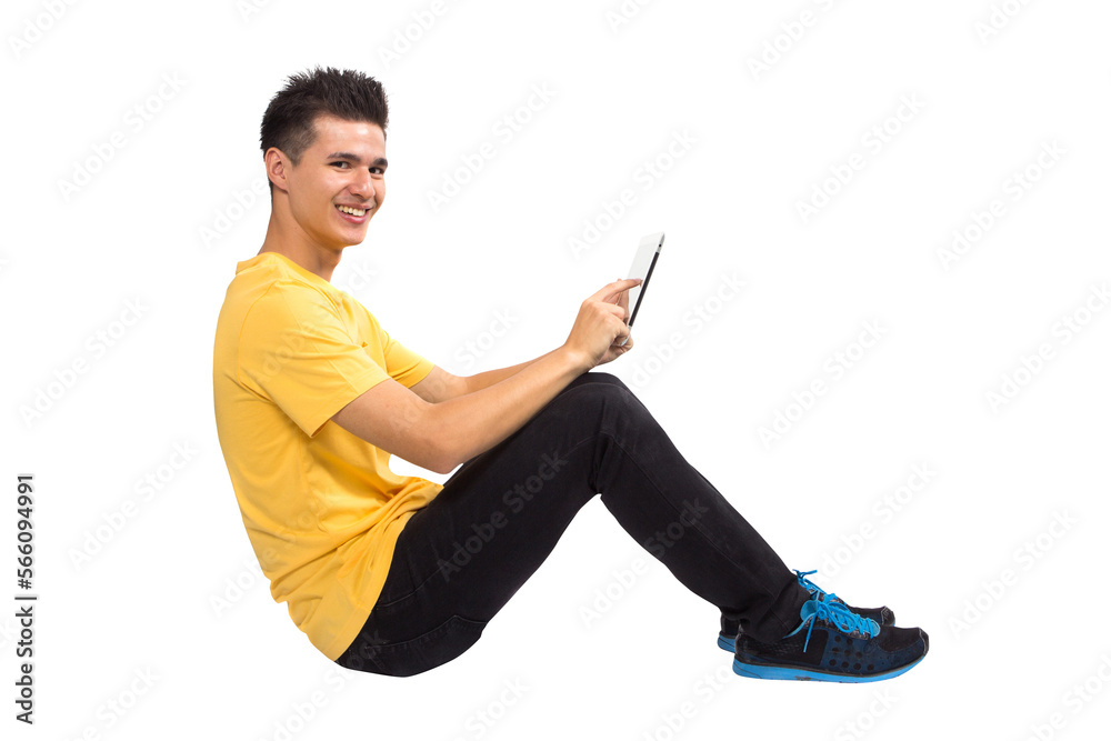 Full body Teenage boy portrait sitting using tablet computer Stock ...