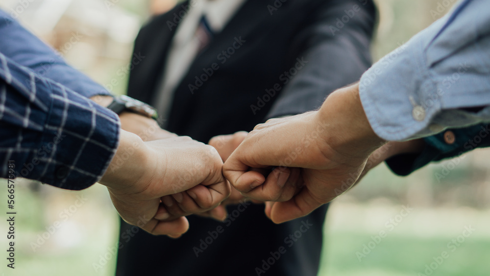 Business people join hands after meeting.World environment day. Global ...