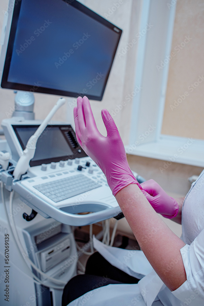 Probe for ultrasound diagnostics close-up. The doctor holds in his ...