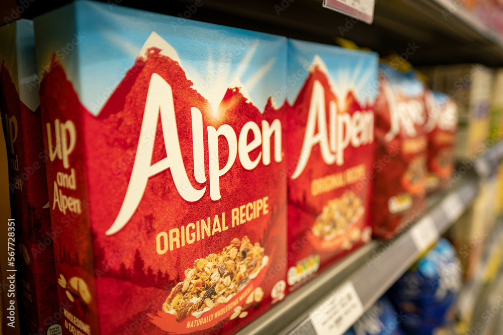 UK: Alpen boxes on supermaket shelf- line of muesli varieties ...