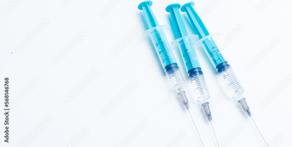 Disposable plastic syringe prepared for injection and vaccination in ...