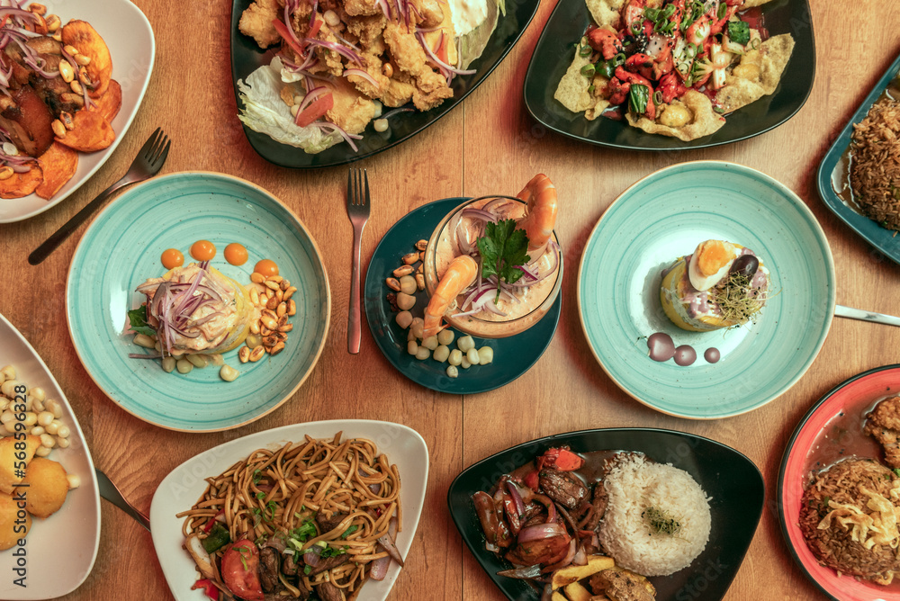 Set of typical Peruvian food recipes, anticuchos, fish jelly, lomo ...