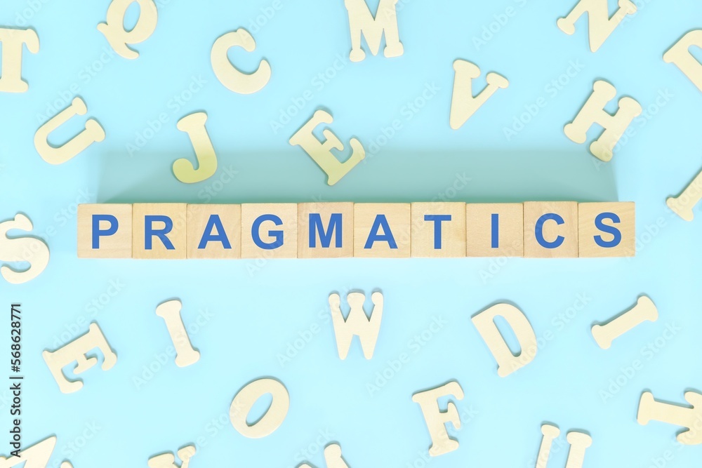 Study pragmatics in linguistics concept. Wooden blocks word typography ...