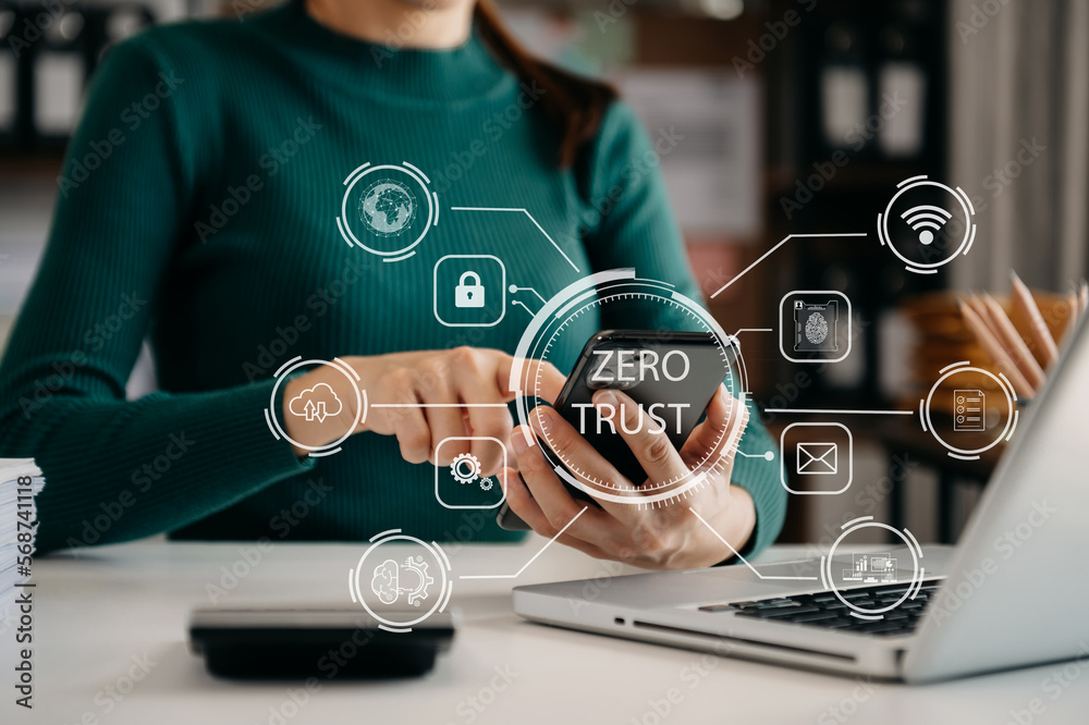 Zero trust security concept Person using computer and tablet with zero ...