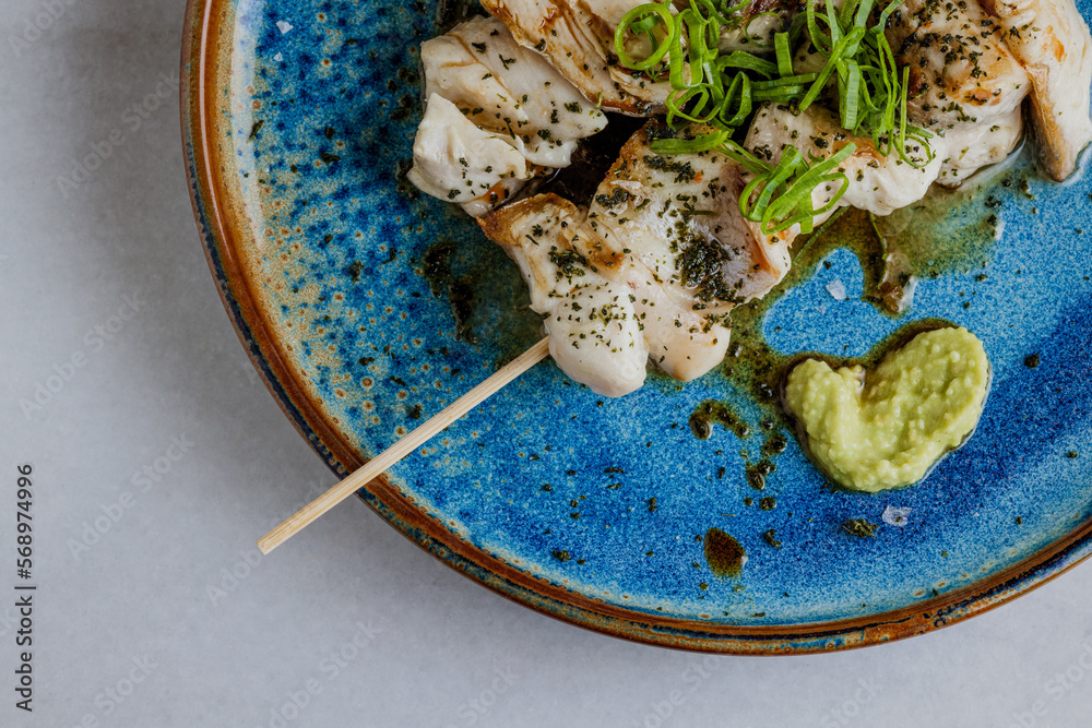 Lemon fish skewer grilled in japanese robata Stock Photo | Adobe Stock