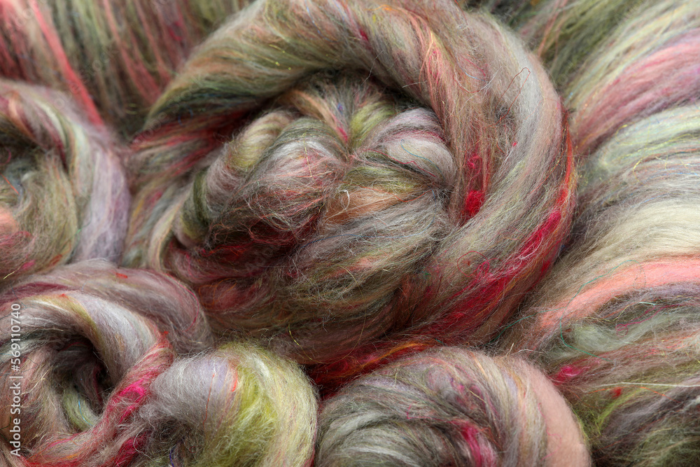 Closeup of lots of beautiful fibres in a roving ready for spinning yarn ...