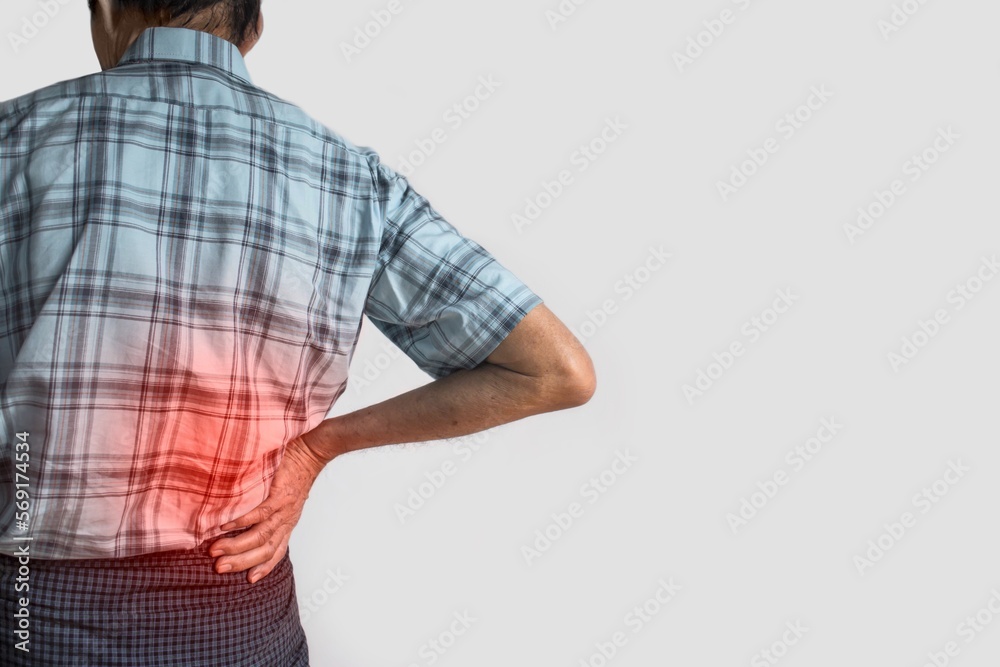 Asian man suffering from right sided low back and loin pain. It can be ...