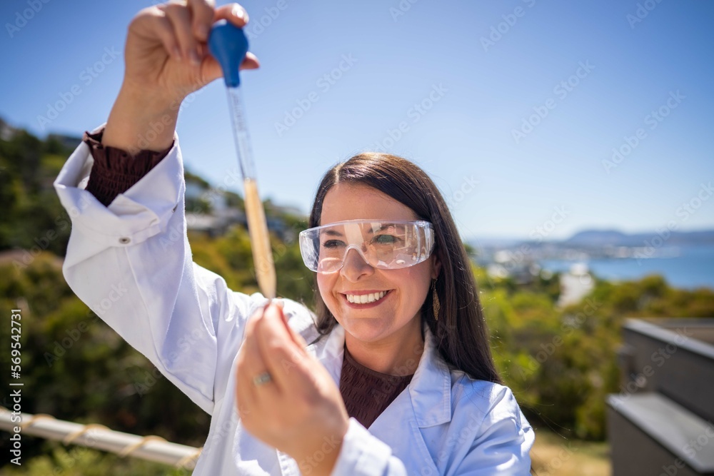 Photo Stock Soil test, female agricultural scientist conducting a soil ...