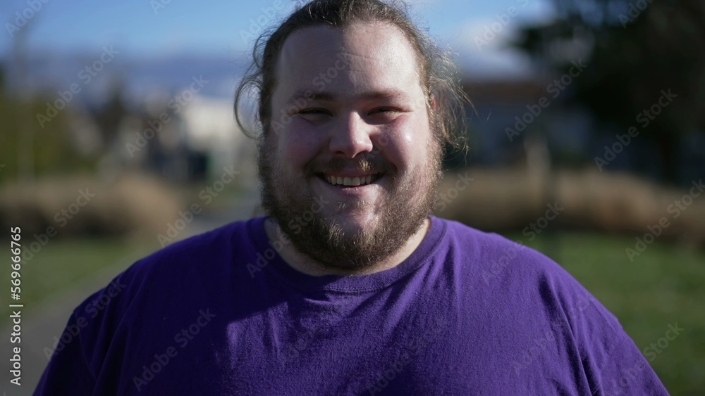 Photo Stock One happy overweight man walking forward outdoors smiling ...