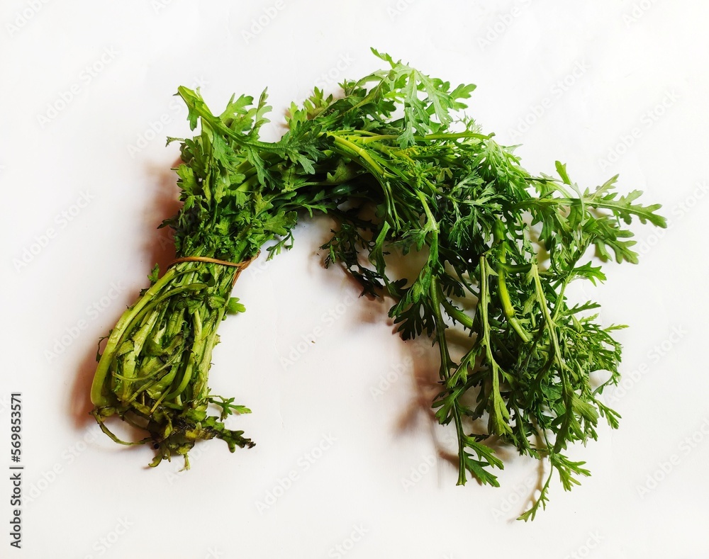 Foto Leafy vegetable - Crown daisy, Japanese green or edible ...