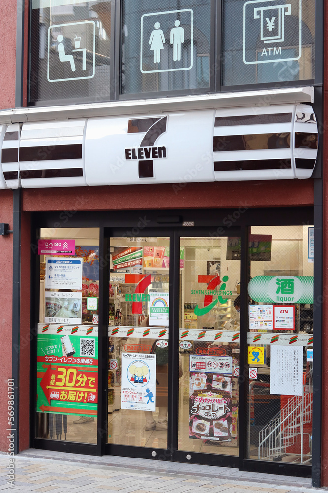 TOKYO, JAPAN - February 9, 2023: Front of a 7-Eleven convenience store in Tokyo's Kagurazaka ...