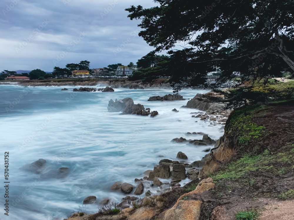 Scenic coastal bay in Monterey California. Rocky beach and rugged ...
