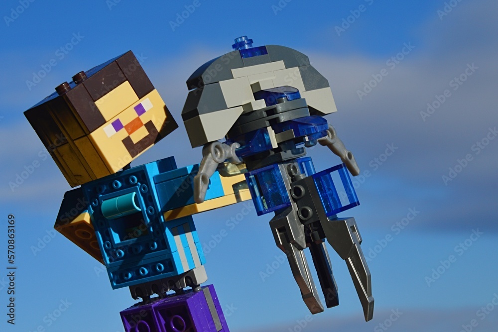 LEGO Minecraft figure of Steve examining model of space ship Jellyfish ...