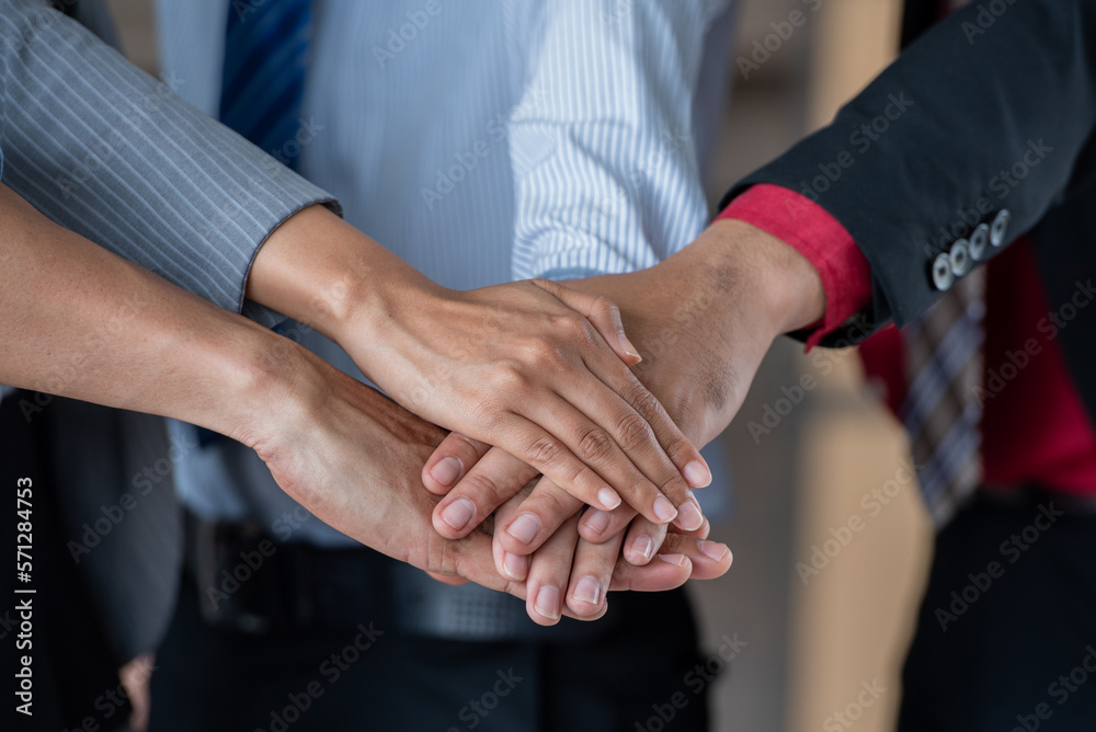 Stock-Foto „business teamwork putting join hands together. Unity and ...