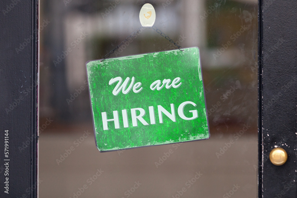 We are hiring sign in a window Stock Photo | Adobe Stock